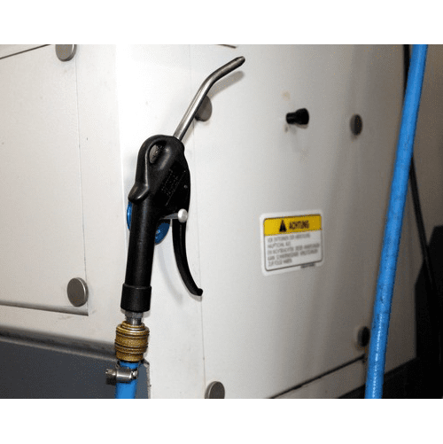 Air blow gun holder with rubberized underside